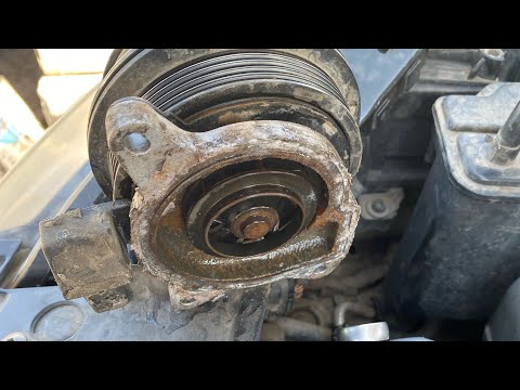 How do you replace the water pump of the Volkswagen 1.4 TSi engine ...