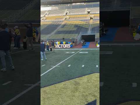 Michigan HC Kyle Whittingham riding a custom UofM motorcycle - BVM Sports