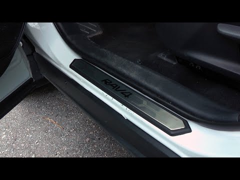 Installation of a stainless steel plate on the trunk threshold of a ...